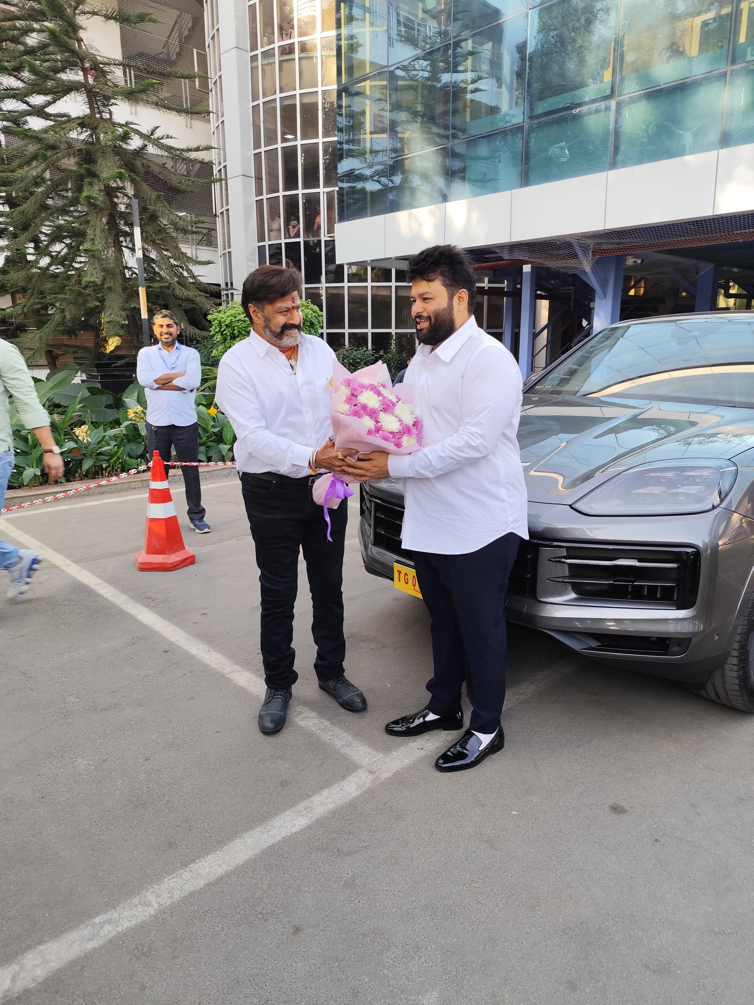 Balakrishna gifts Porsche to music director Thaman