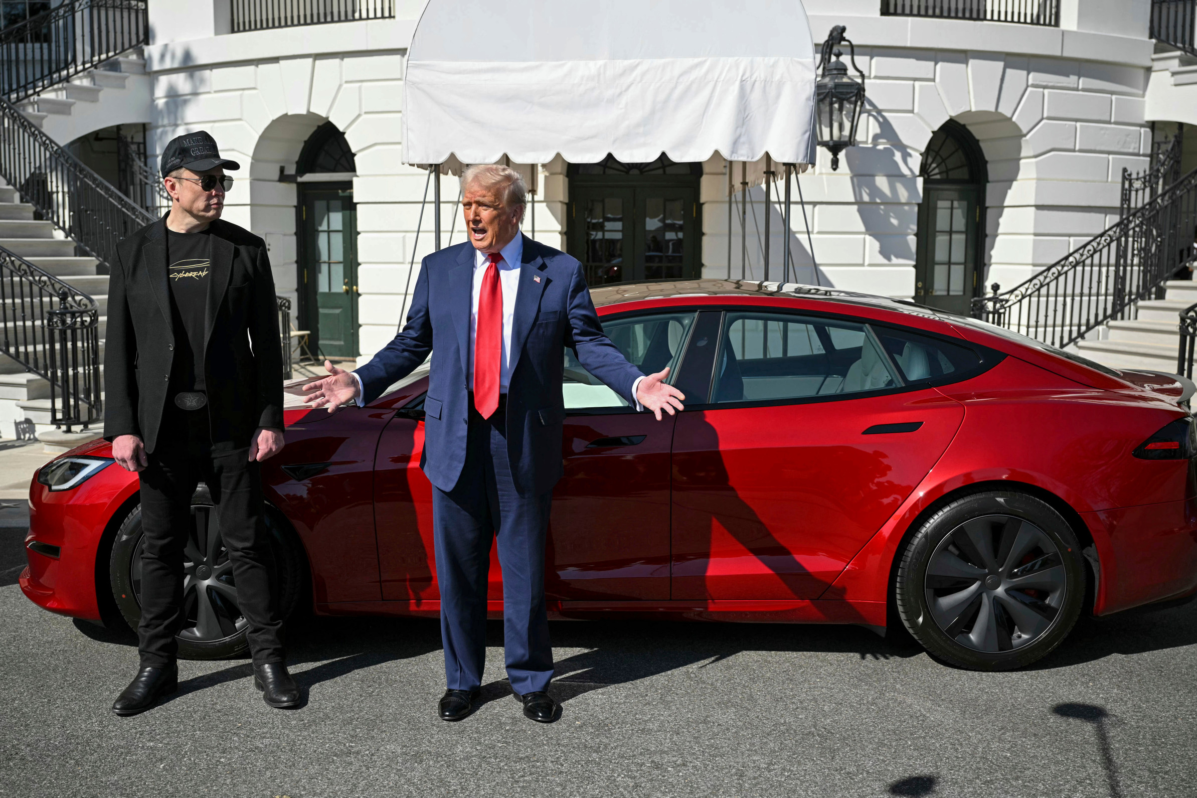 Trump buys a new Tesla at White House to show support for Musk