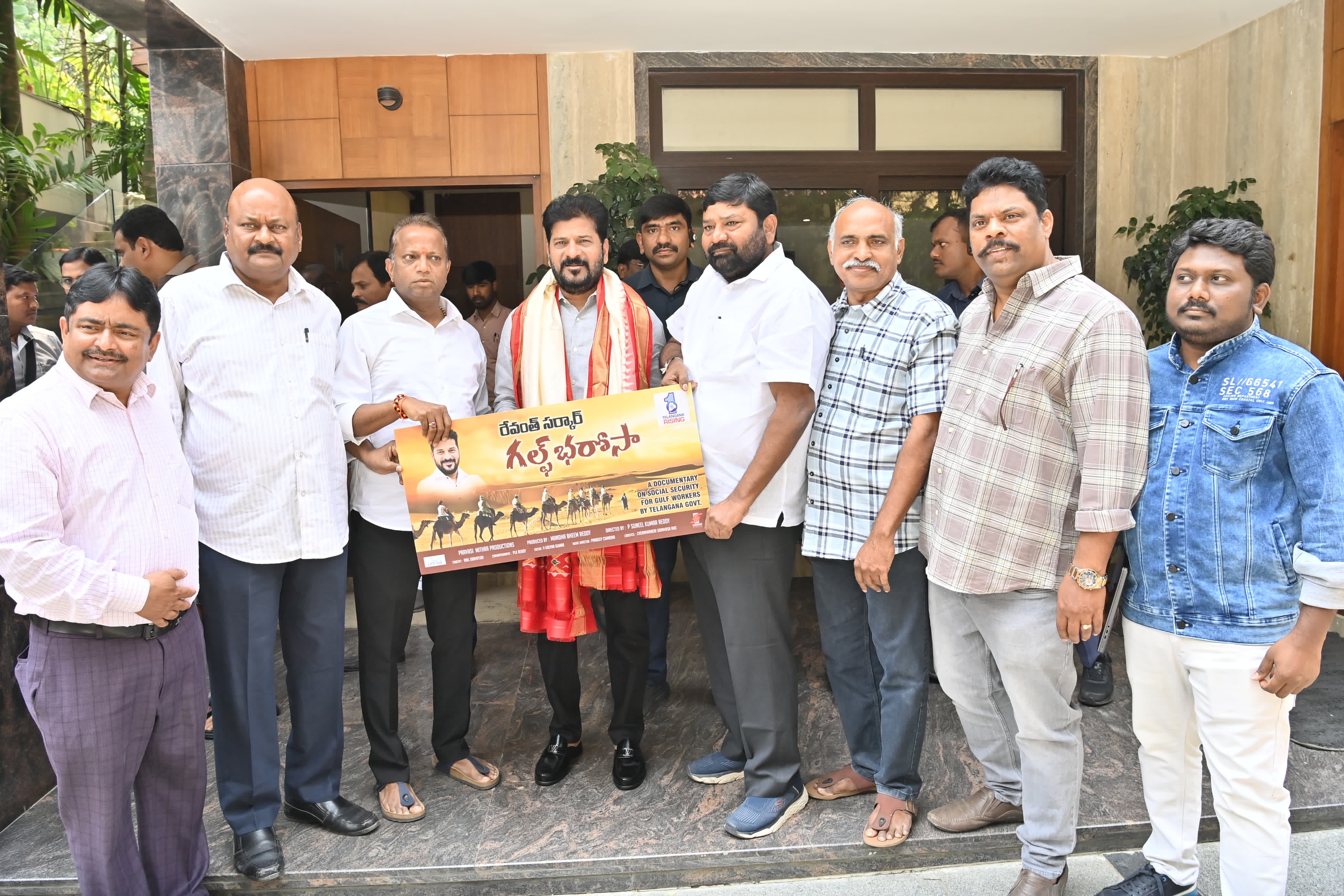 Revanth Reddy unveils Gulf Bharosa scheme poster