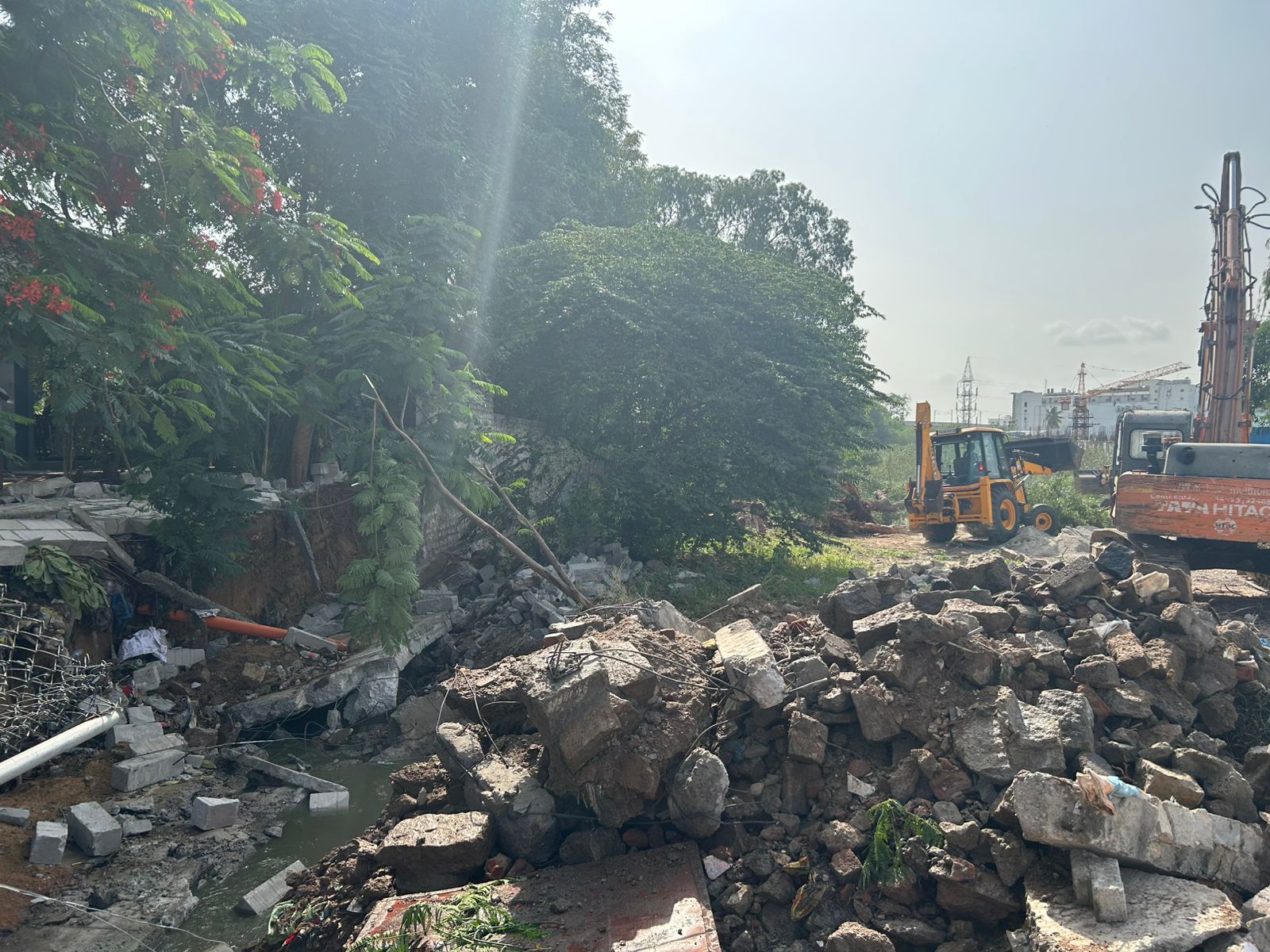 HYDRAA Demolishes Illegal Constructions on Nala in Habibnagar