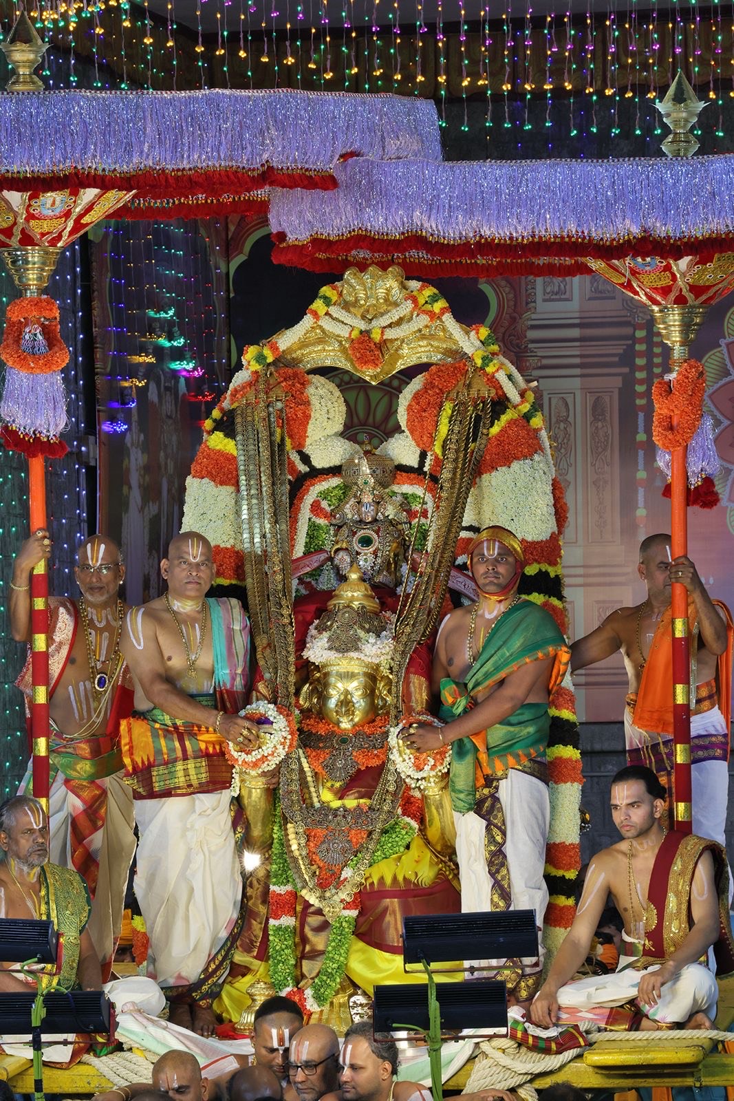 Thousands Brave Rain, Cold To Witness Garuda Vahana Seva At Tirumala