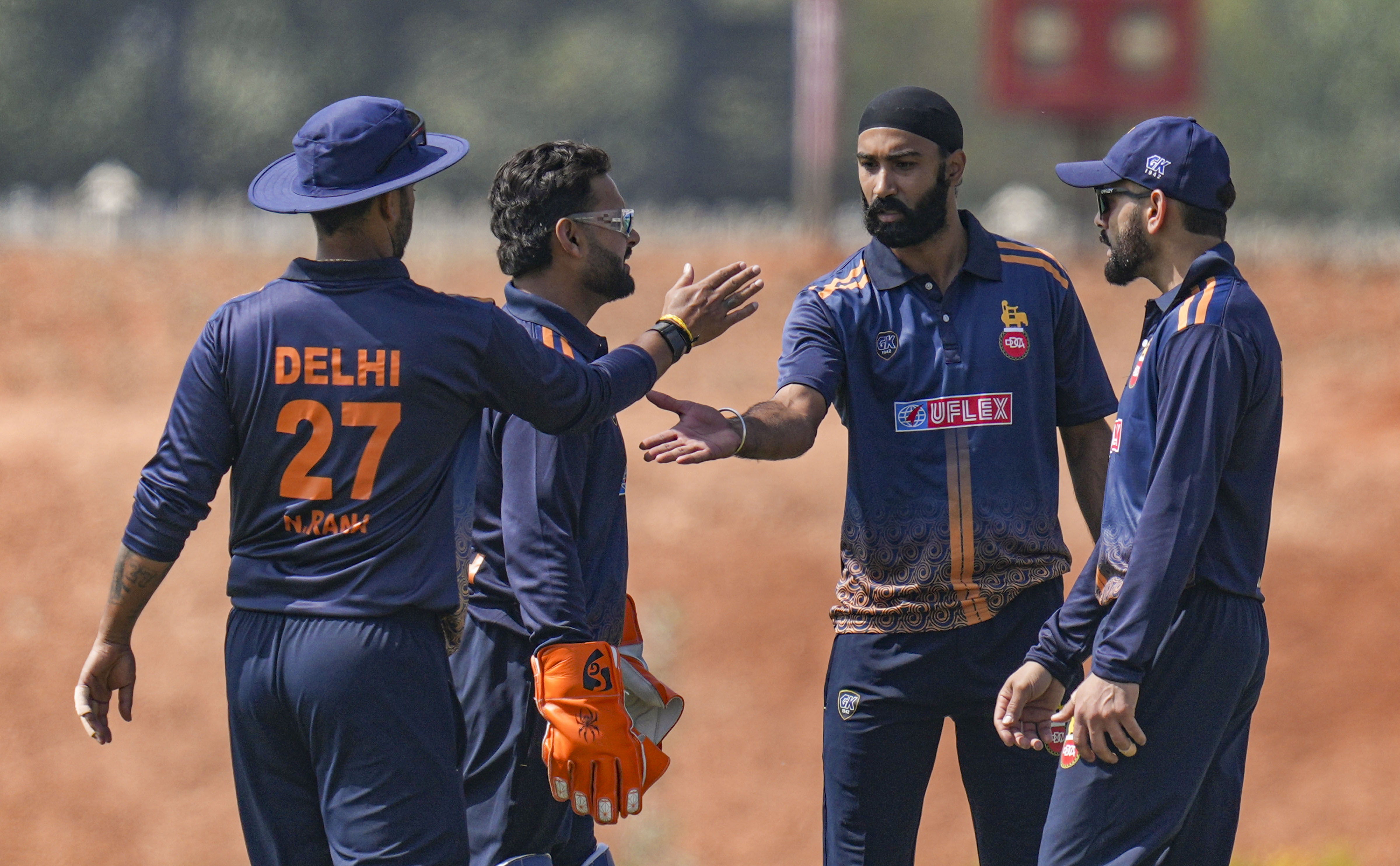 Kohli, Simarjeet Sparkle as Delhi Down Andhra by 4 Wickets